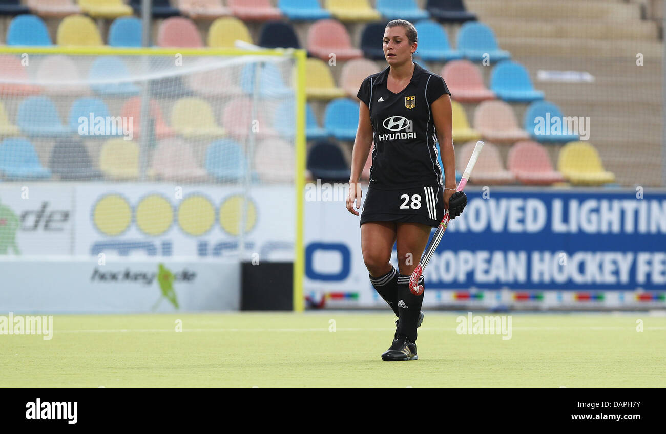Germany's Julia Mueller leaves the pitch disappointed after a women's ...