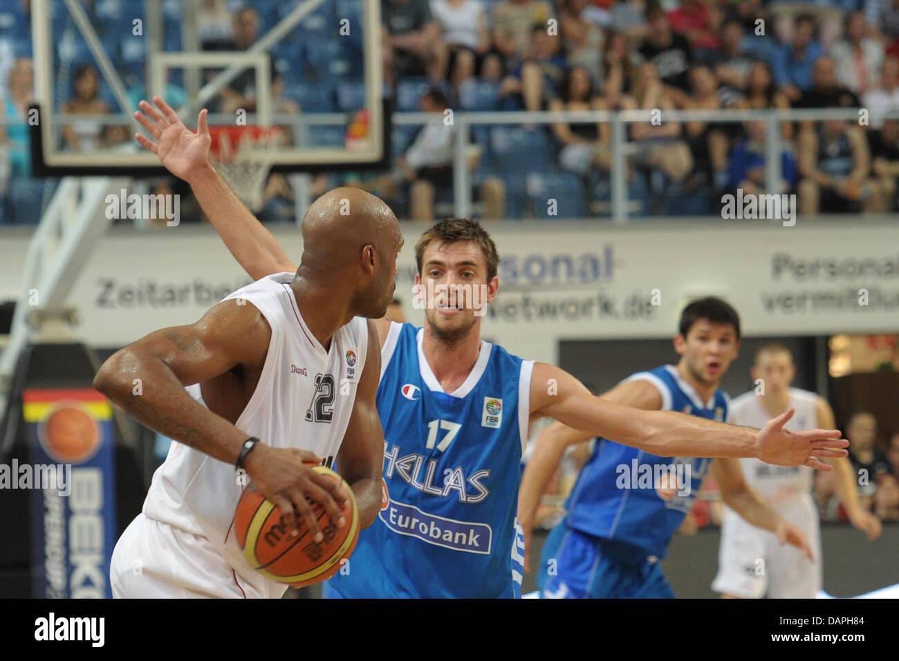 Greek national player Vaggelis Mantzaris (r) tries to block Belgian ...