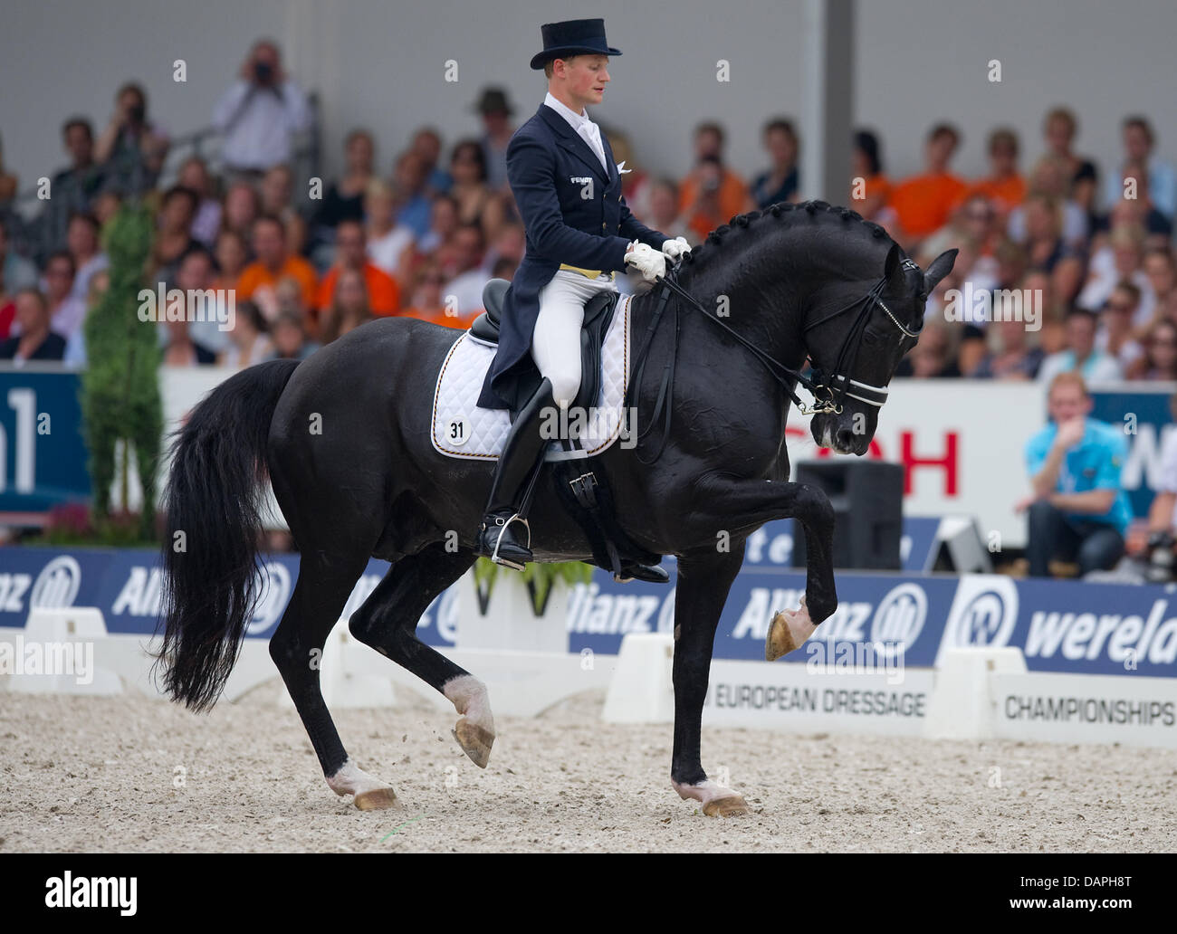 German dressage rider Matthias Alexander Rath srides his horse Totilas ...