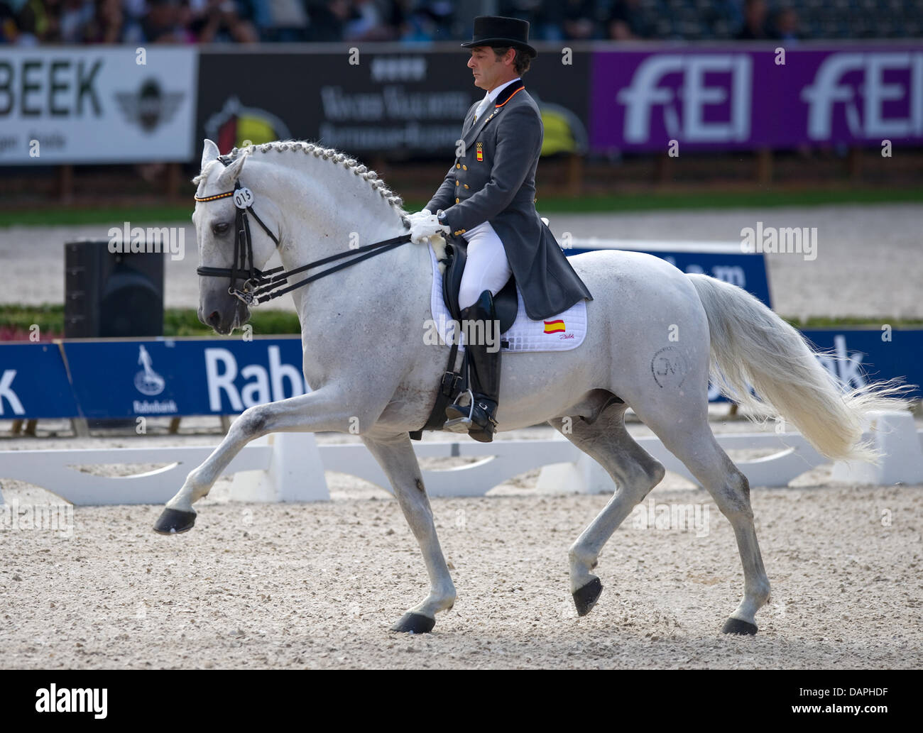 Spanish equestrian Juan Manuel Munoz Diaz cheers as he rides on his ...