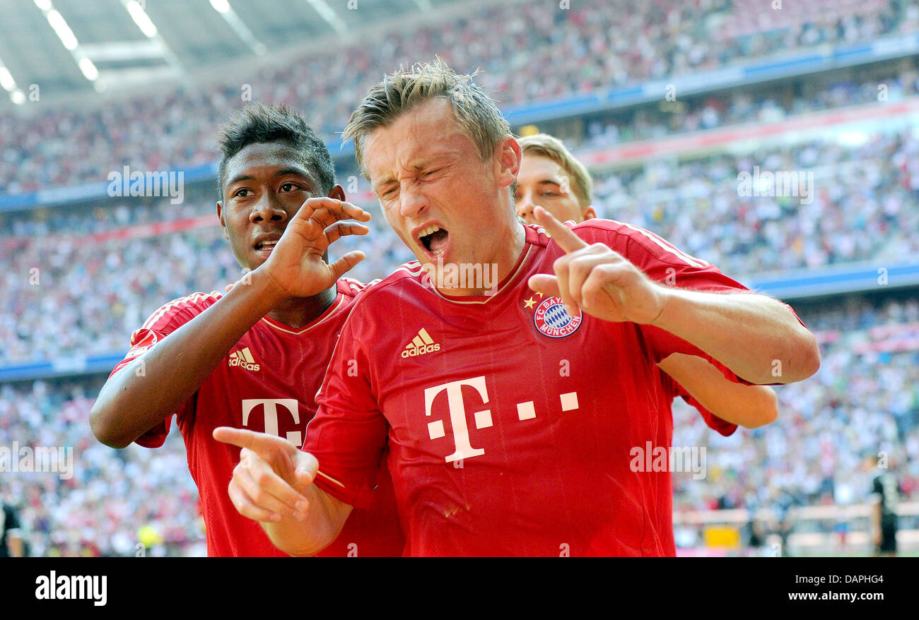 Bayern Munich's Ivica Olic (C) cheers about his 5-0 goal with David ...