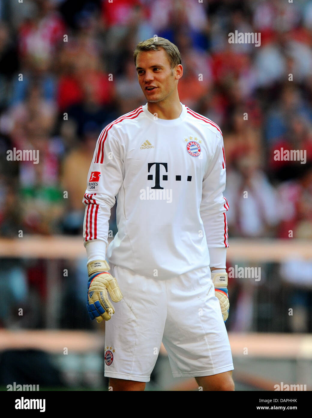 Munich's goalkeeper Manuel Neuer smiles during the German Bundesliga ...
