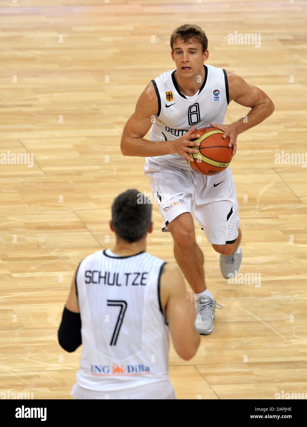 German national basketball player Heiko Schaffartzig (BACK) passes the ...