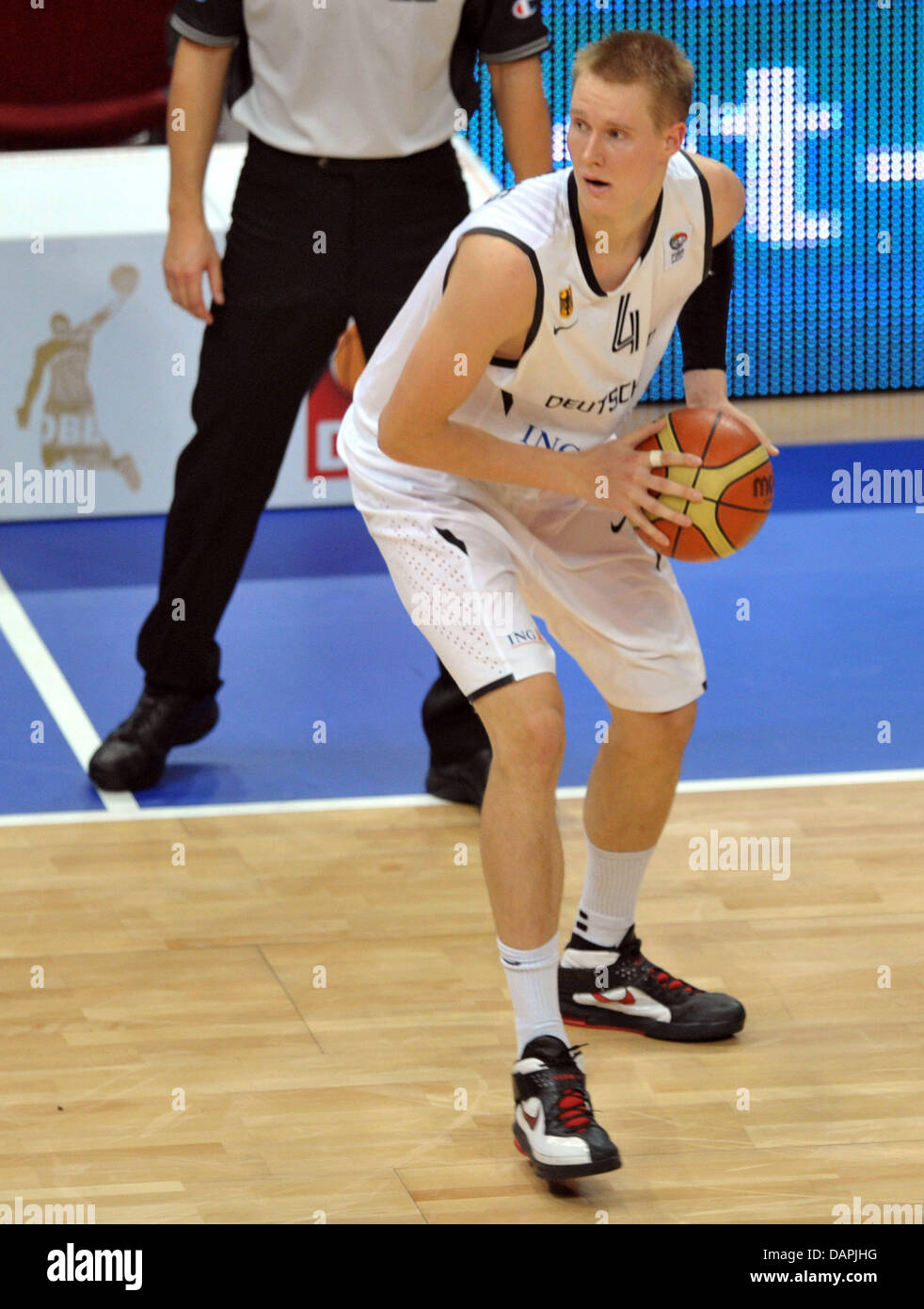 German national basketball player Robin Benzig is about to pass the ...