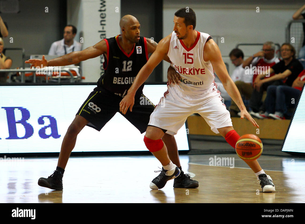 Turkish national basketball player Hidayet Türkoglu (R) tries to ...