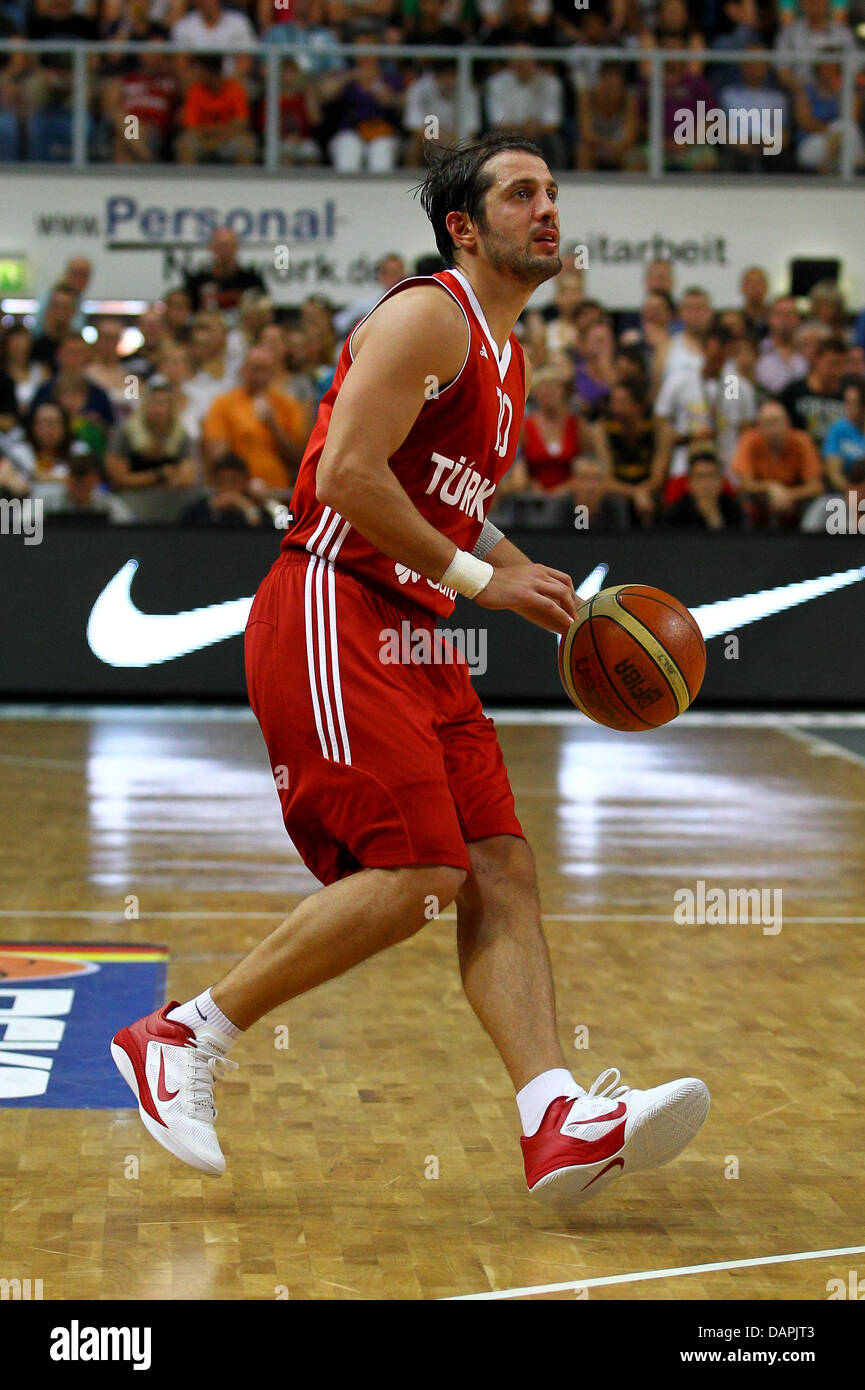 Turkey's national basketball player Kerem Tunerci is about to shoot the ...