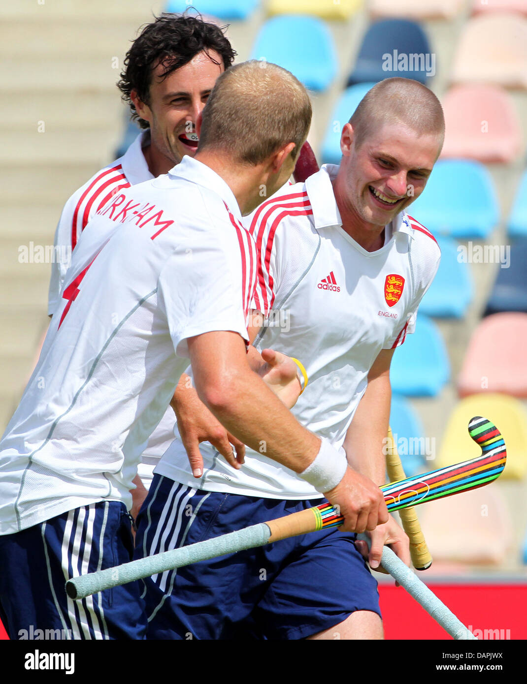 England's Ashley Jackson (R) celebrates her goal with Rob Moore and ...
