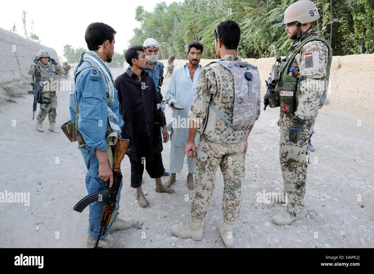 Police officer from the Afghan National Police (ANP) and German Federal ...