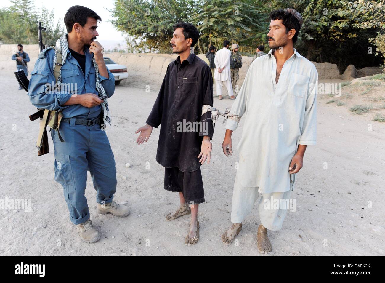 Police officer from the Afghan National Police (ANP) and German Federal ...
