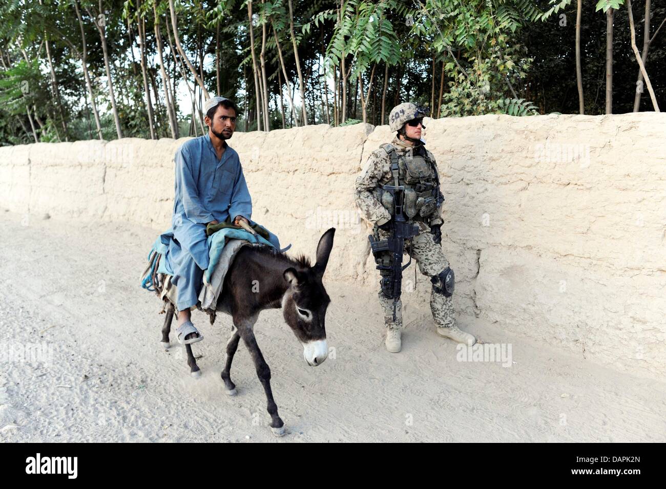 German Federal Armed soldier patrol the district of Charrah Darreh ...