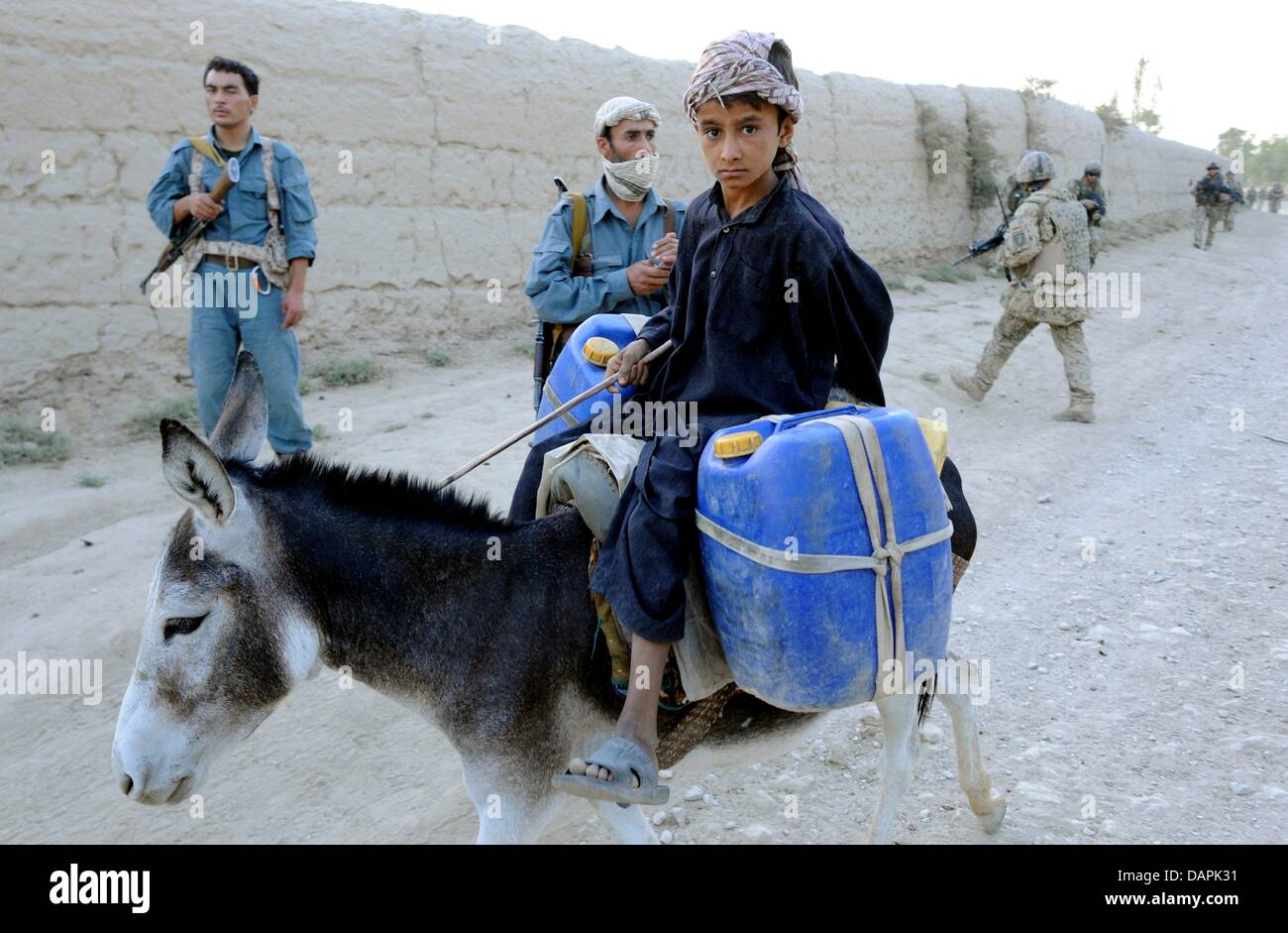 German Federal Armed soldier patrol the town of Nawabad in the district ...