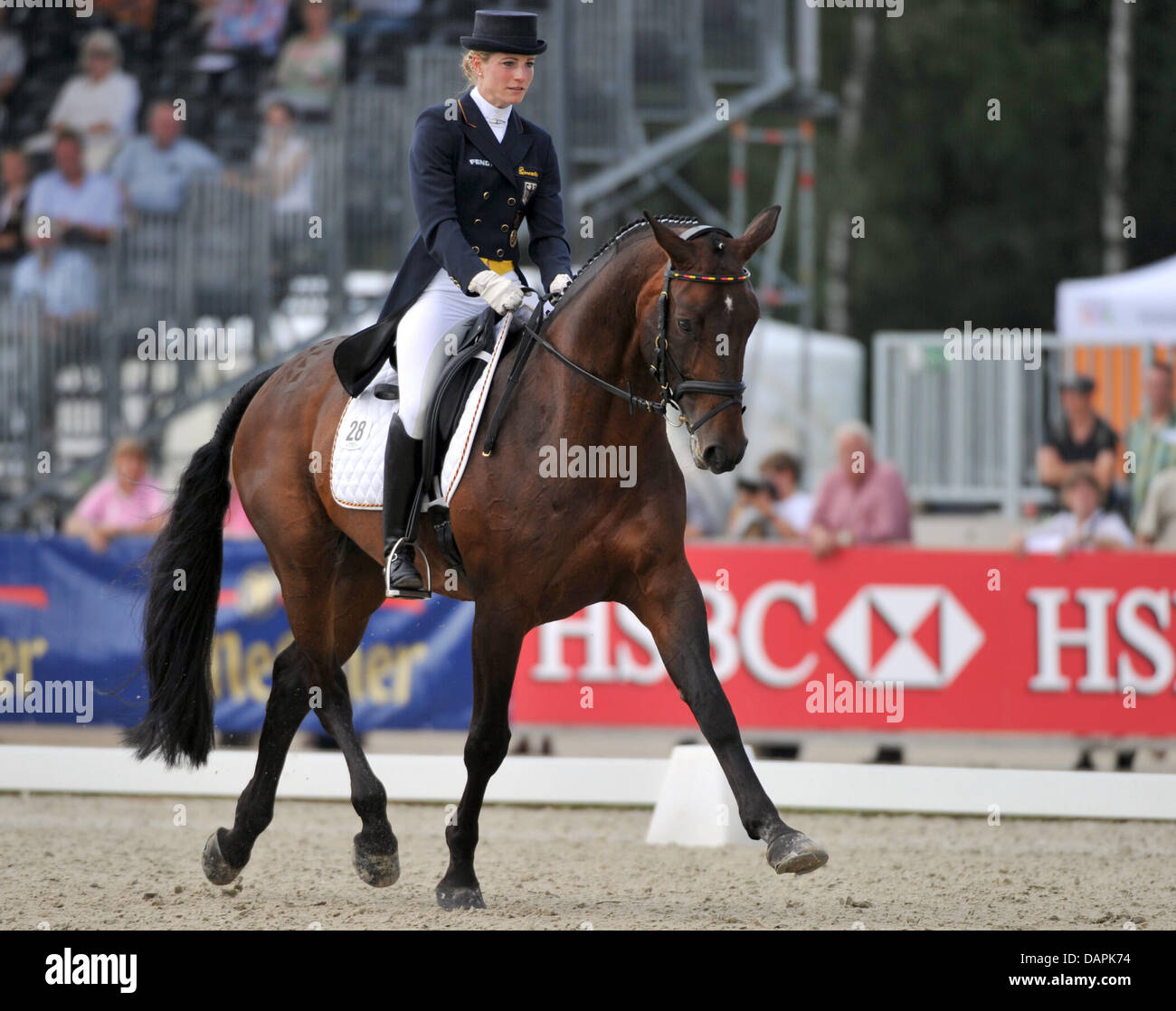 The German eventing equestrian Julia Mestern in action on her horse ...