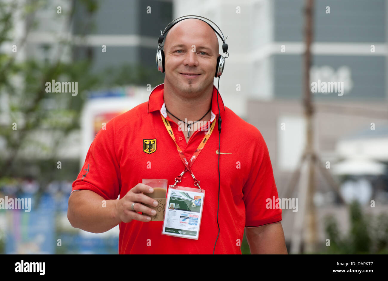 German hammer thrower Markus Esser walks through athlete's village in ...