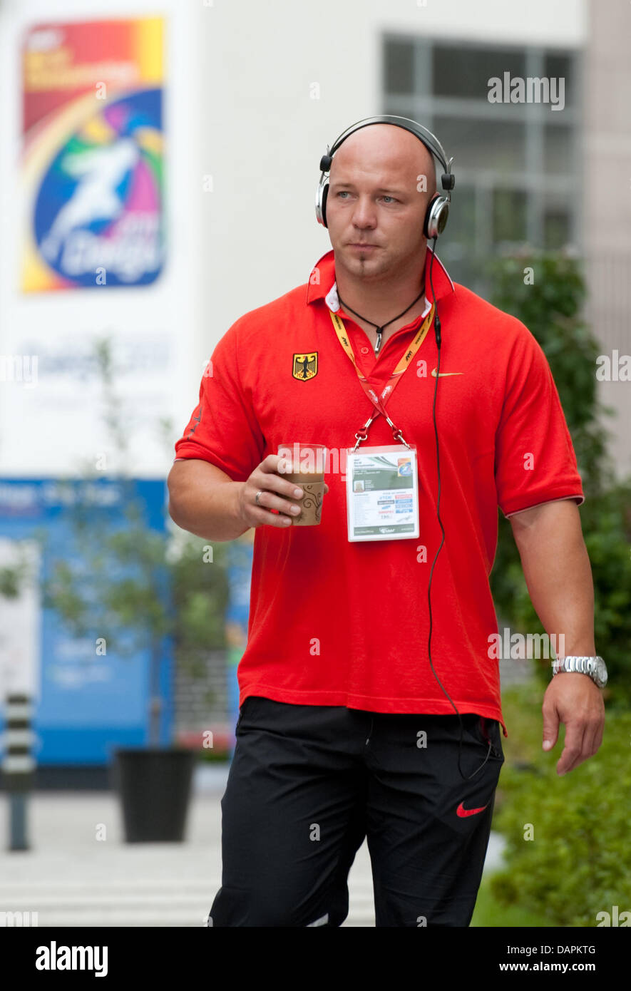 German hammer thrower Markus Esser leaves the athlete's village in ...