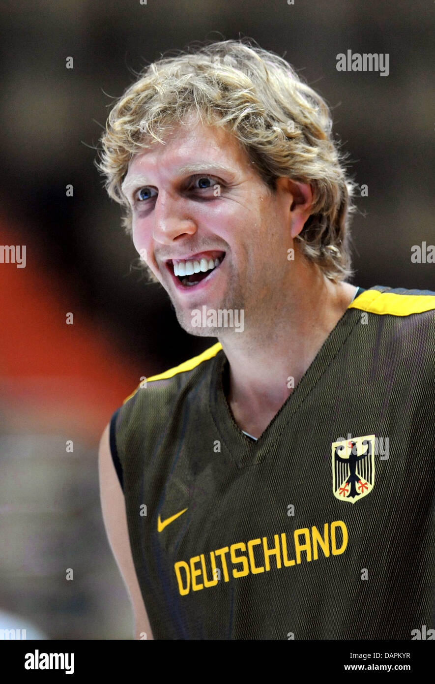German basketball player Dirk Nowitzki smiles during a practice session ...