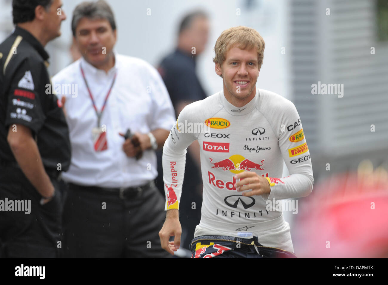 German Formula One driver Sebastian Vettel of Red Bull runs trough the ...