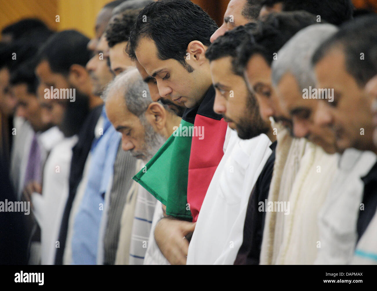 Believers pray on Friday, 26 August 2011 in the Al-Kabir mosque in ...