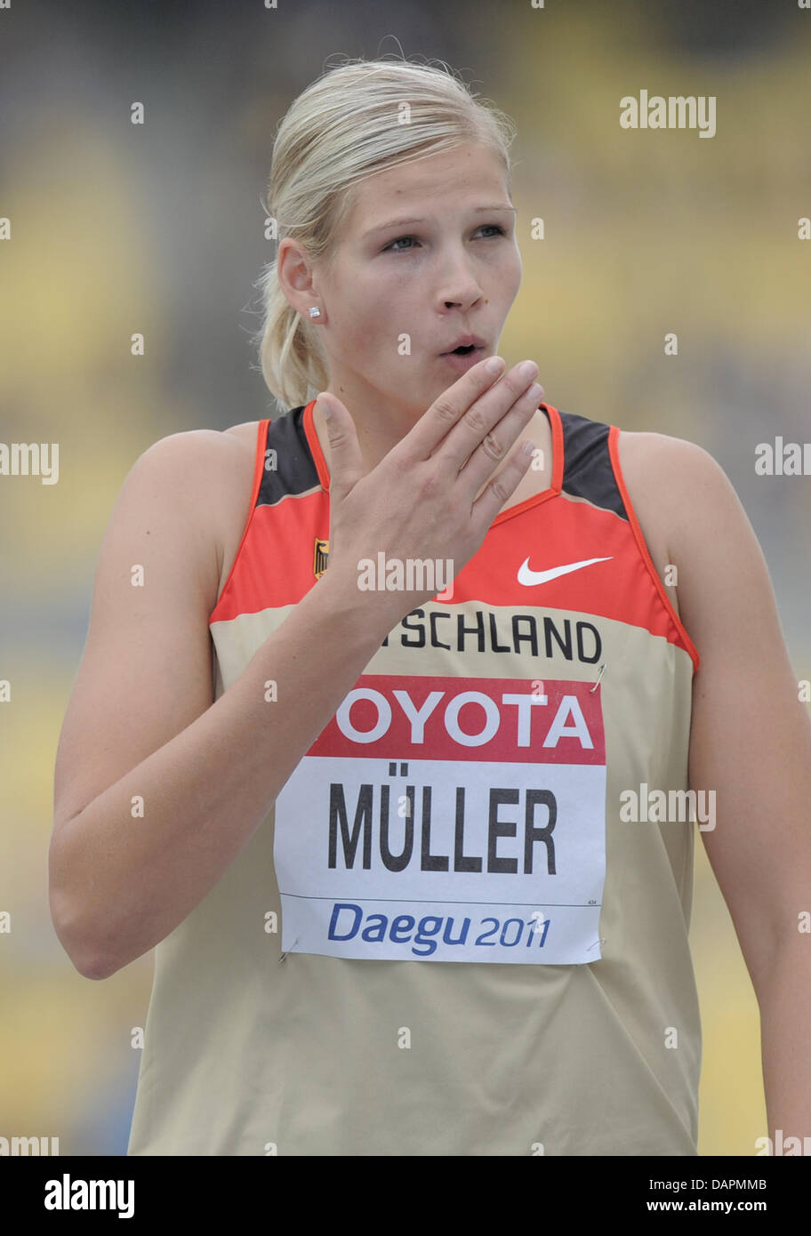 Nadine Müller of Germany reacts in the Women's Discus qualification at ...