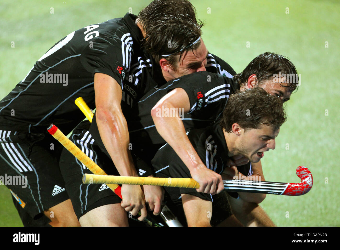 German national hockey players Oskar Deecke (R), Christopher Wesley and ...