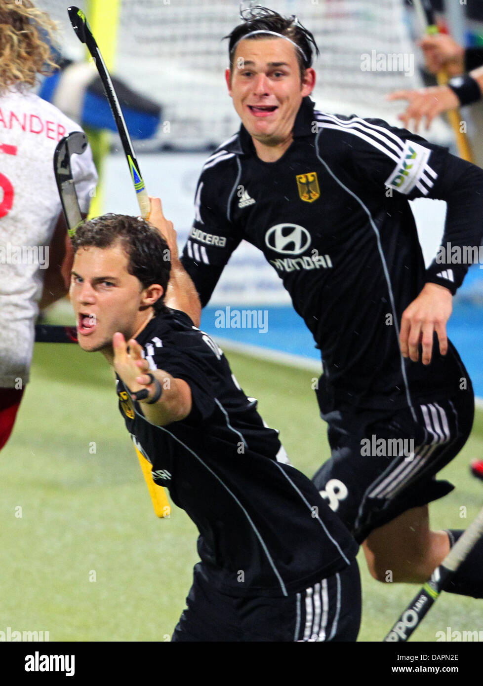 German national hockey players Oskar Deecke (L) and Christopher Wesley ...
