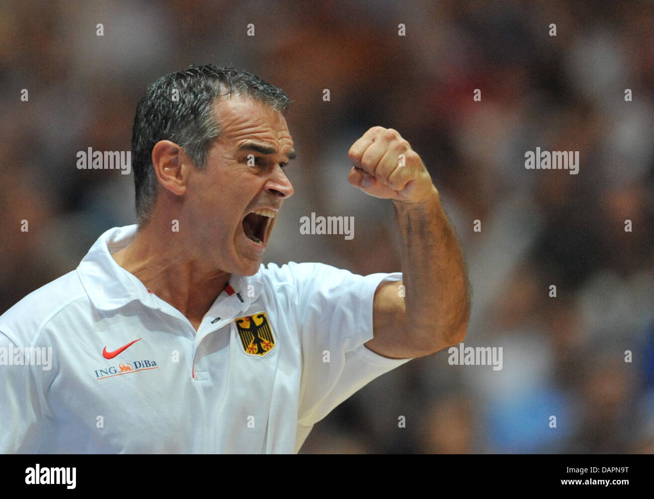 Germany's head coach Dirk Bauermann celebrates during the international ...