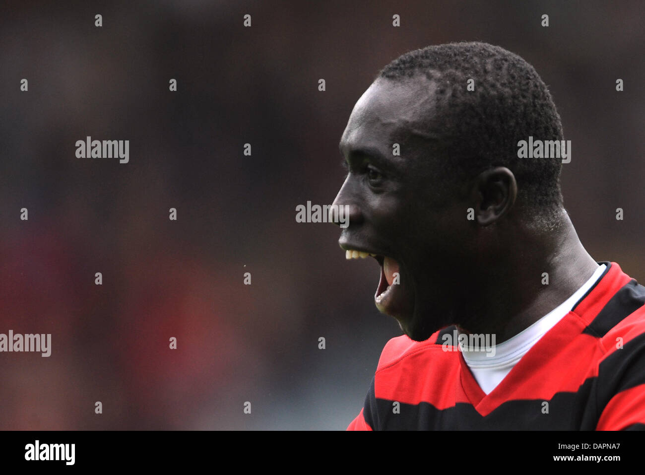 Freiburg's Papiss Cisse celebrates the 2-0 goal during the German ...