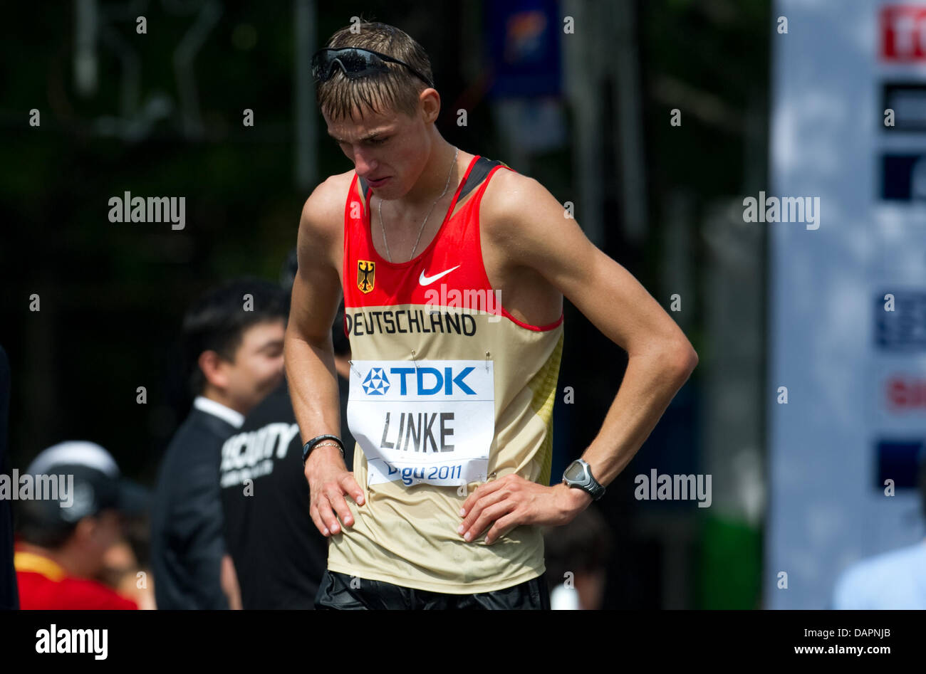 Christopher Linke of Germany reacts after the Men's 20 kilometre race ...