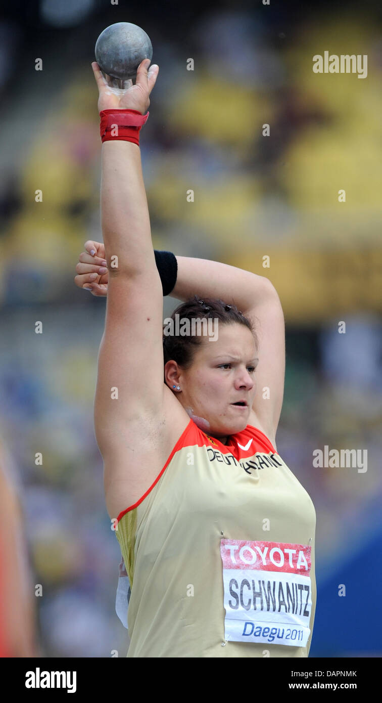 Christina Schwanitz of Germany competes in the Women's Shot Put ...