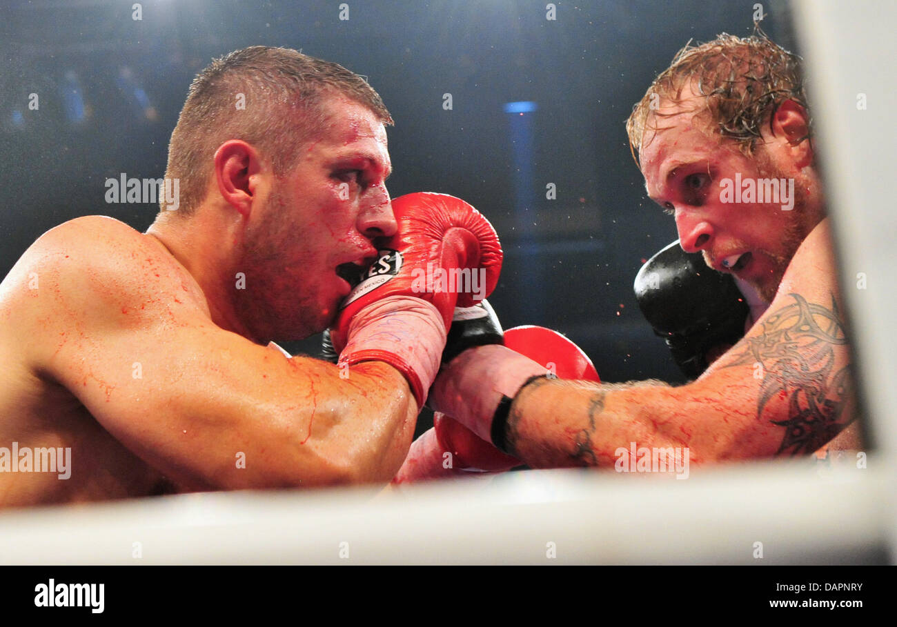 Boxing professionals from Robert Helenius from Finland (R) and Sergei ...