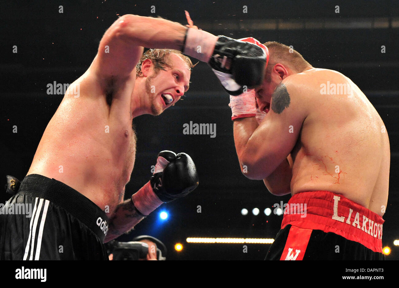 Boxing professionals from Robert Helenius from Finland (L) and Sergei ...