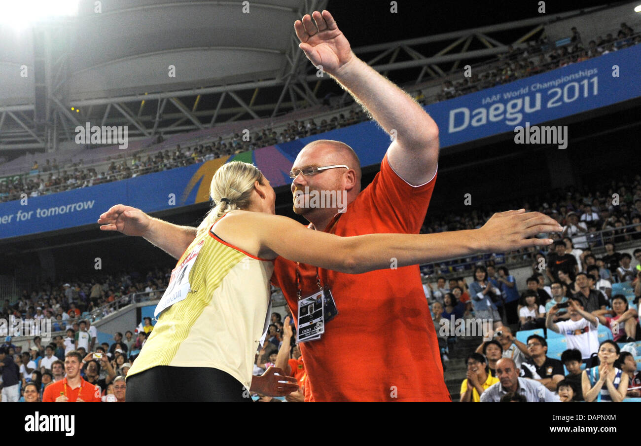 Nadine Müller of Germany celebrates with coach Rene Sack after winning ...