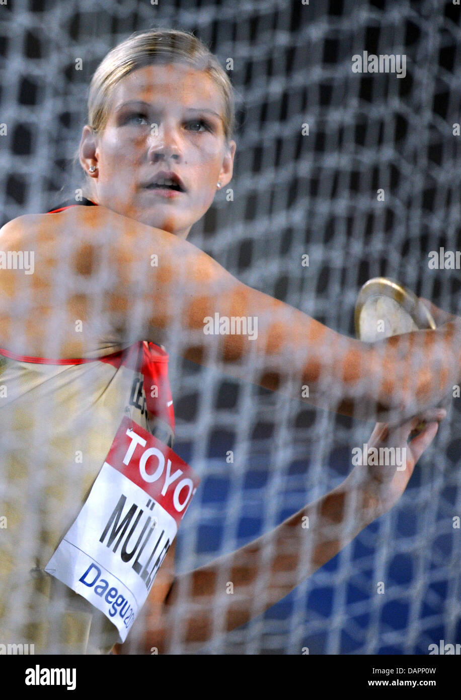 Nadine Müller of Germany competes the Women's Discus final at the 13th ...