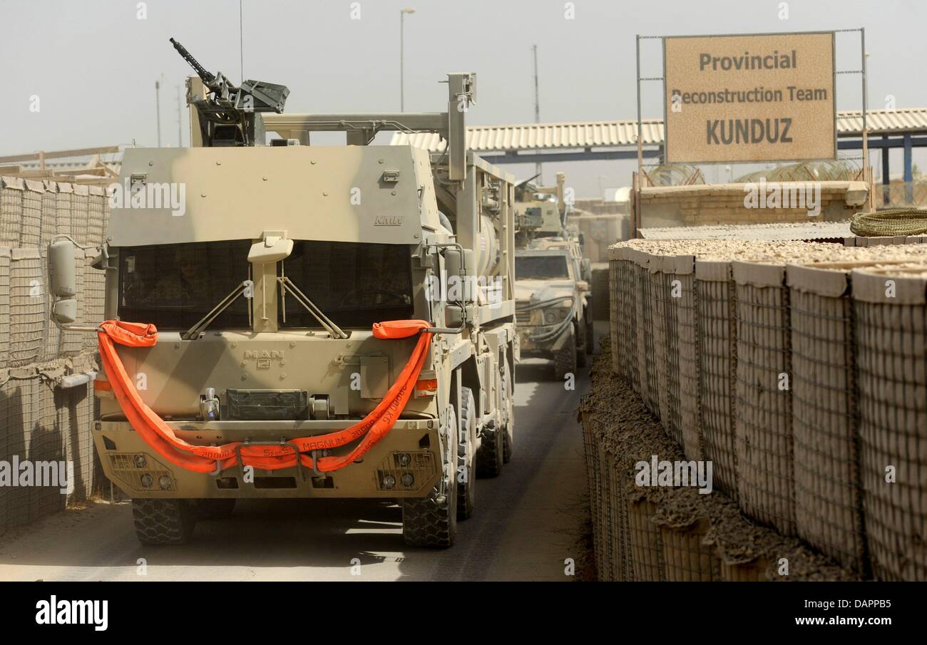 A German Bundeswehr logistic convoy leaves the camp in Kundus ...