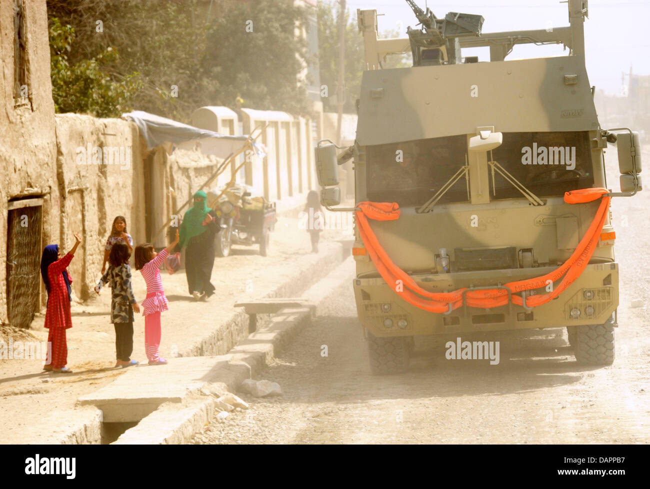 A German Bundeswehr logistic convoy rides to an outpost near Kundus ...
