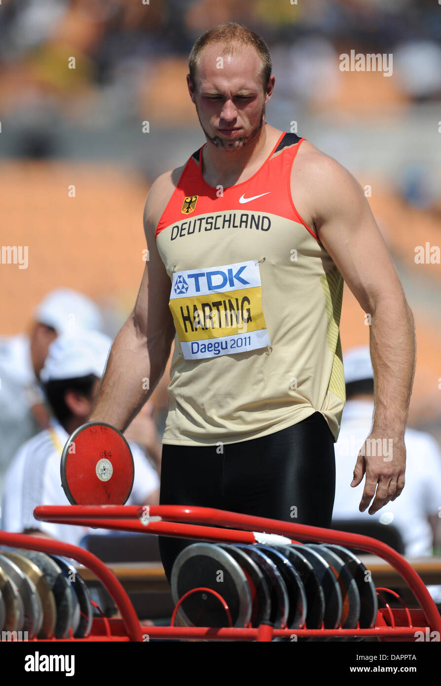 Robert Harting of Germany prepares in Qualification of the mens Discus ...