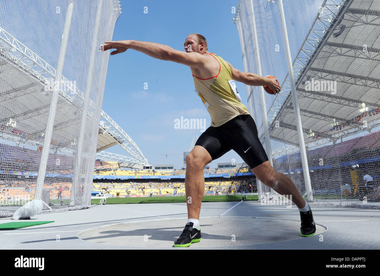 Robert Harting of Germany competes in the Men's Discus Throw ...