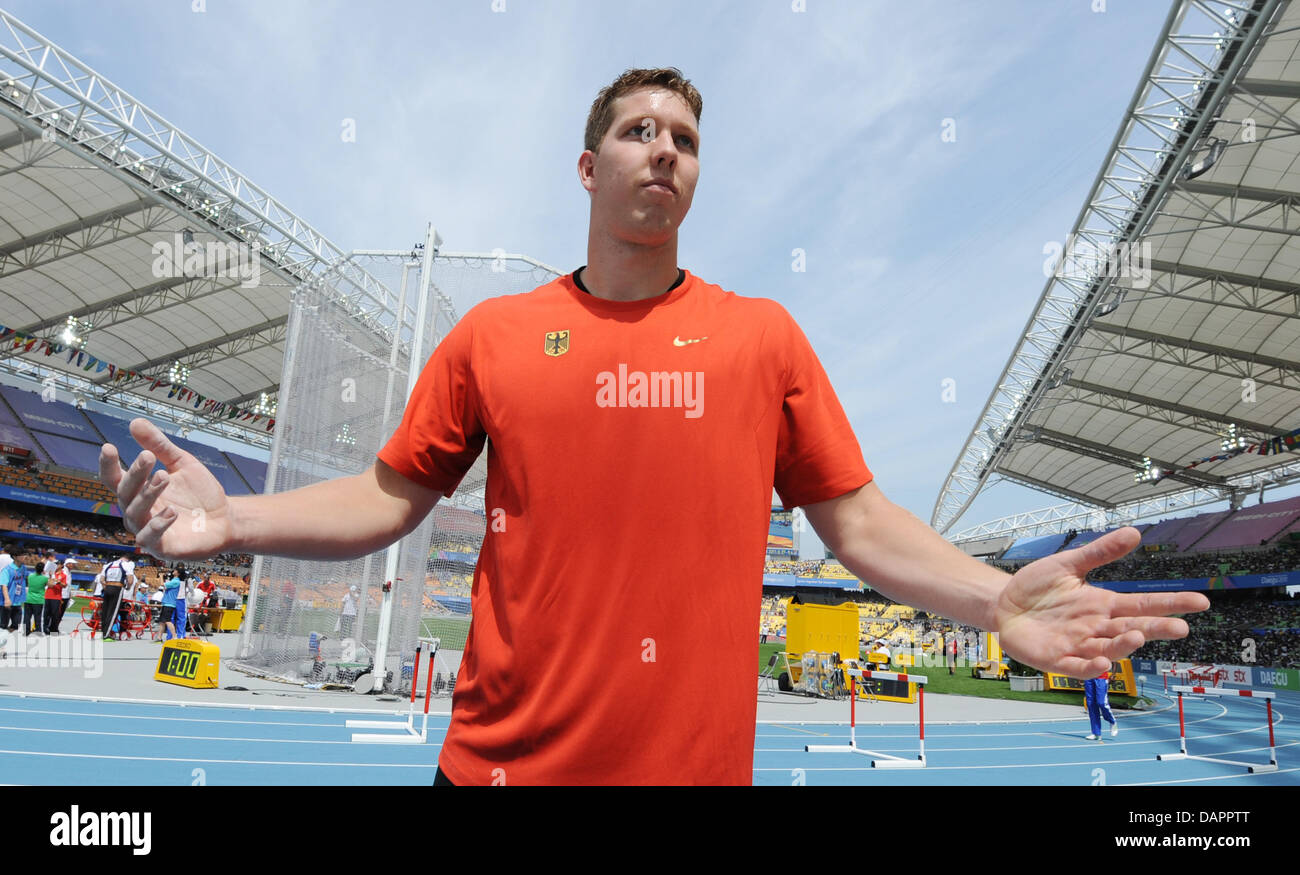 Markus Münch of Germany reacts in the Men's Discus Throw qualification ...