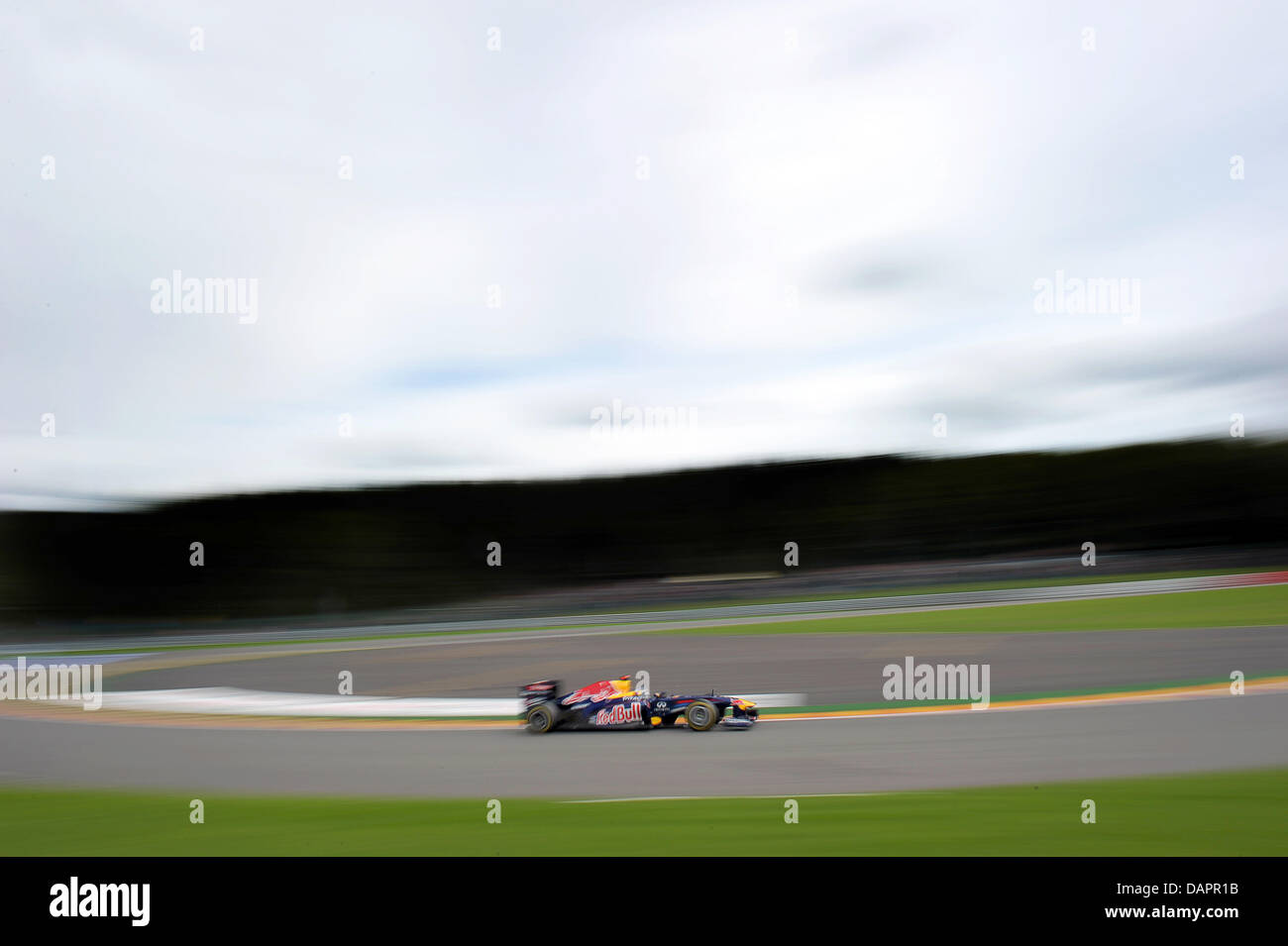 German Formula One driver Sebastian Vettel of Red Bull steers his car ...