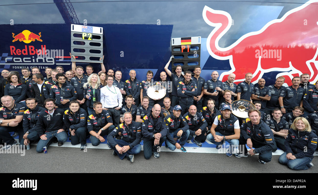 The Red Bull Racing team celebrates its one-two finish at the official ...