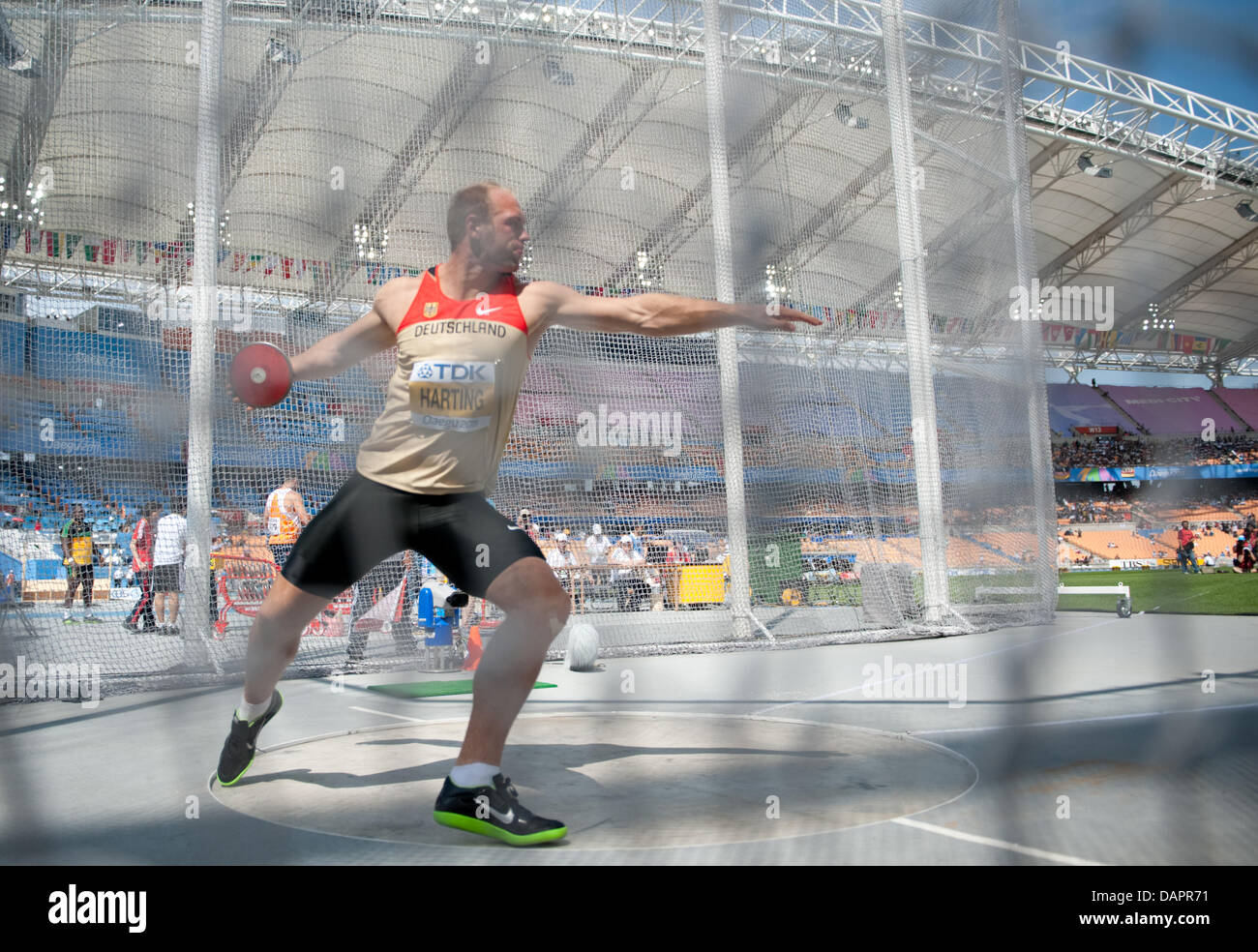 Robert Harting of Germany competes in Qualification of the mens Discus ...