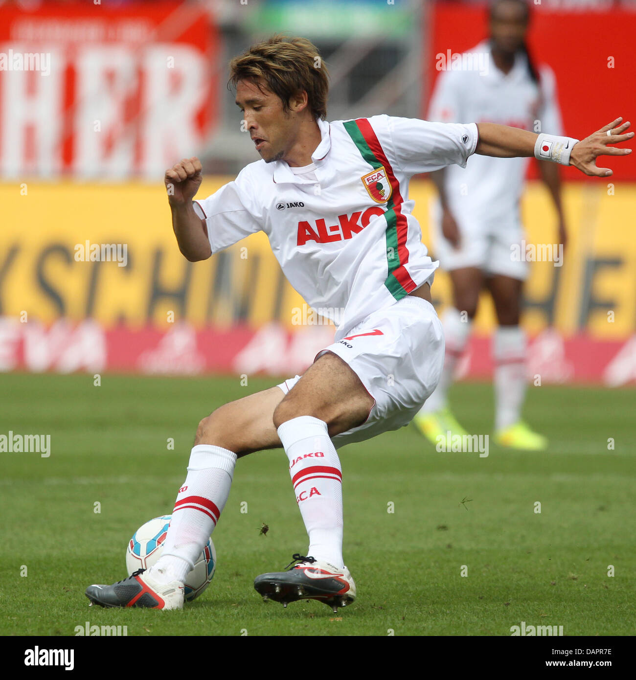 Augsburg's Hajime Hosogai plays the ball during the German Bundesliga ...