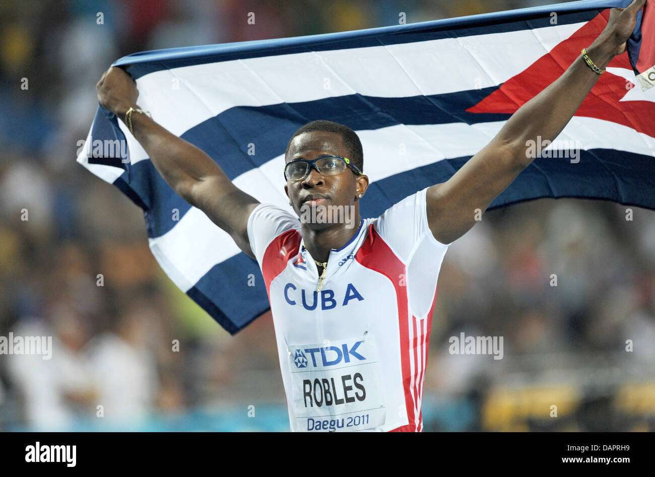 Dayron Robles from Cuba reacts after the Men's 110m Hurdles final at ...