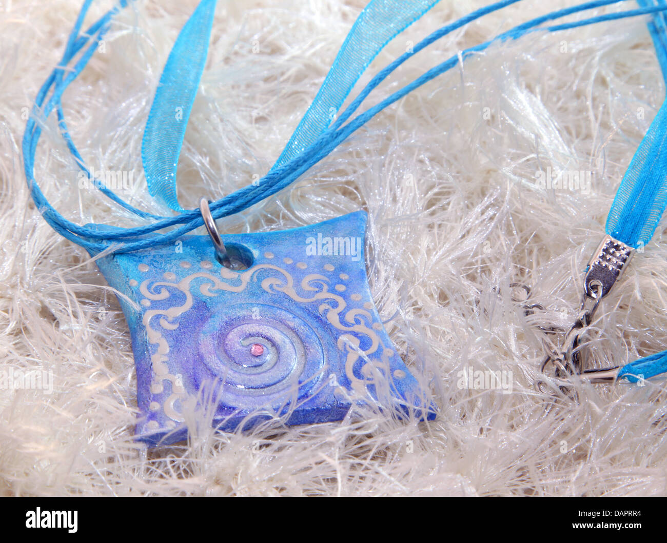 Tusk amulet hi-res stock photography and images - Alamy