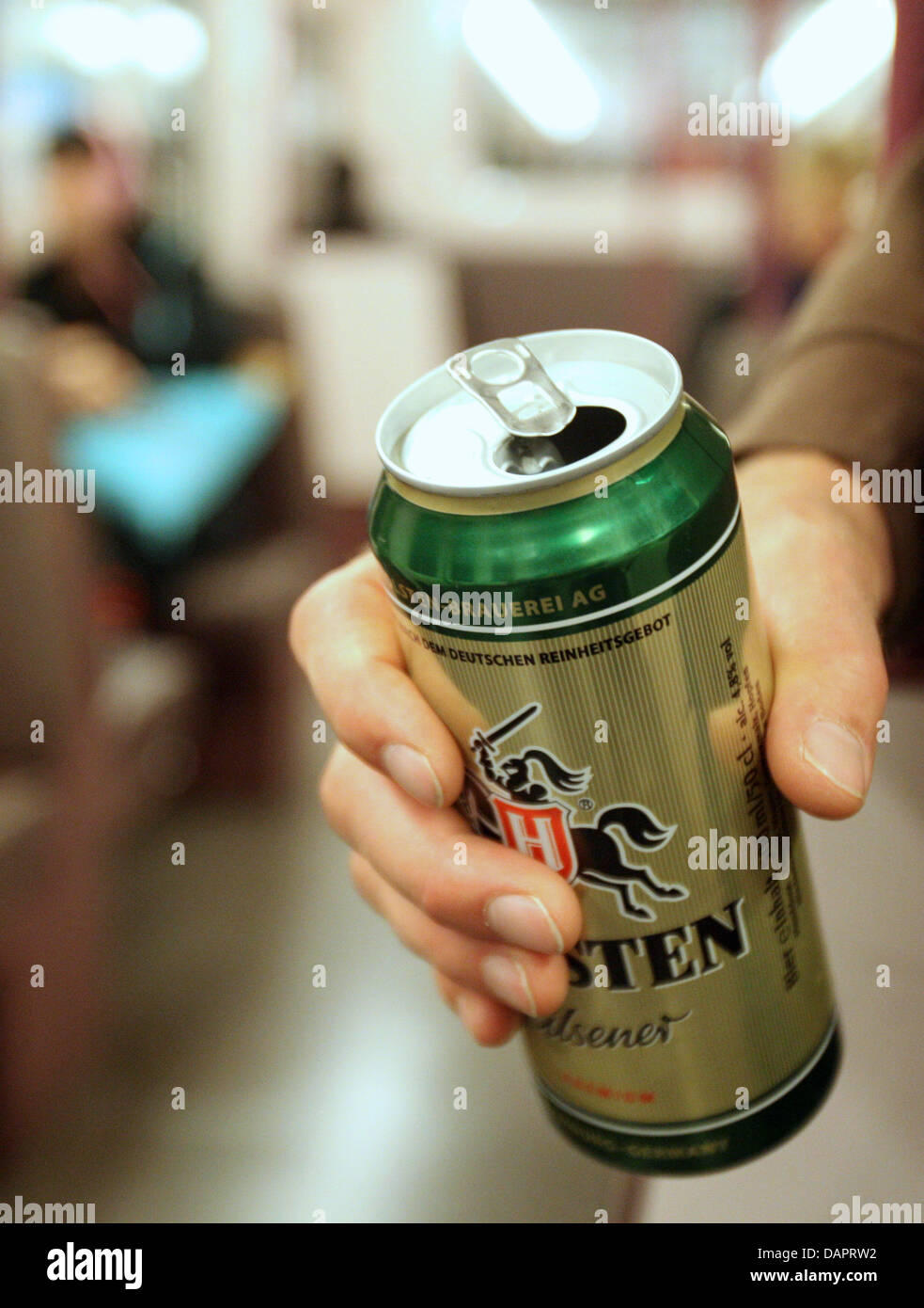 ILLUSTRATION - A man drinks a beer inside a subway in Hamburg, Germany ...