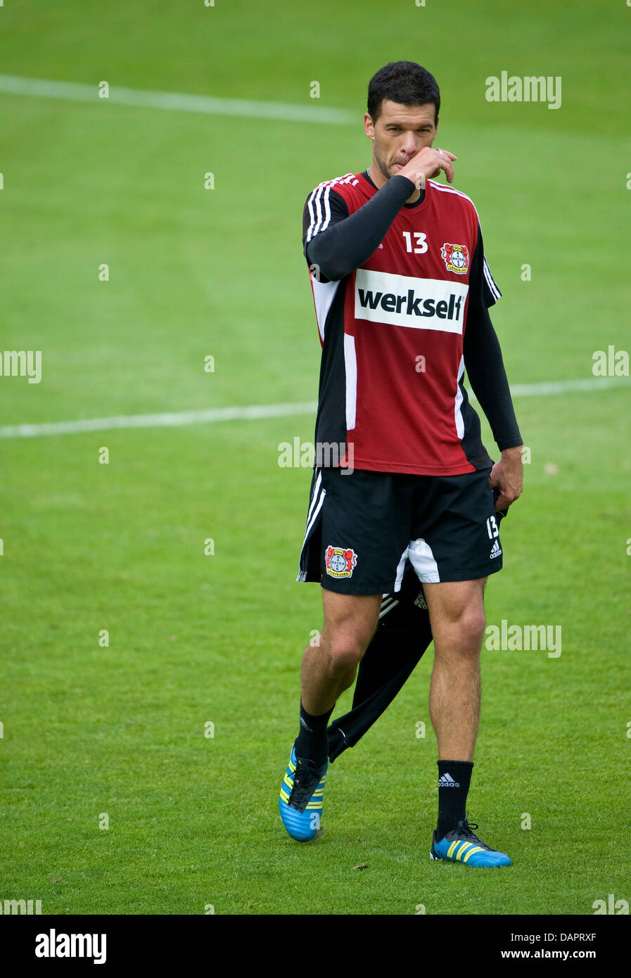Michael Ballack from Bayer Leverkusen walks over the pitch after the ...