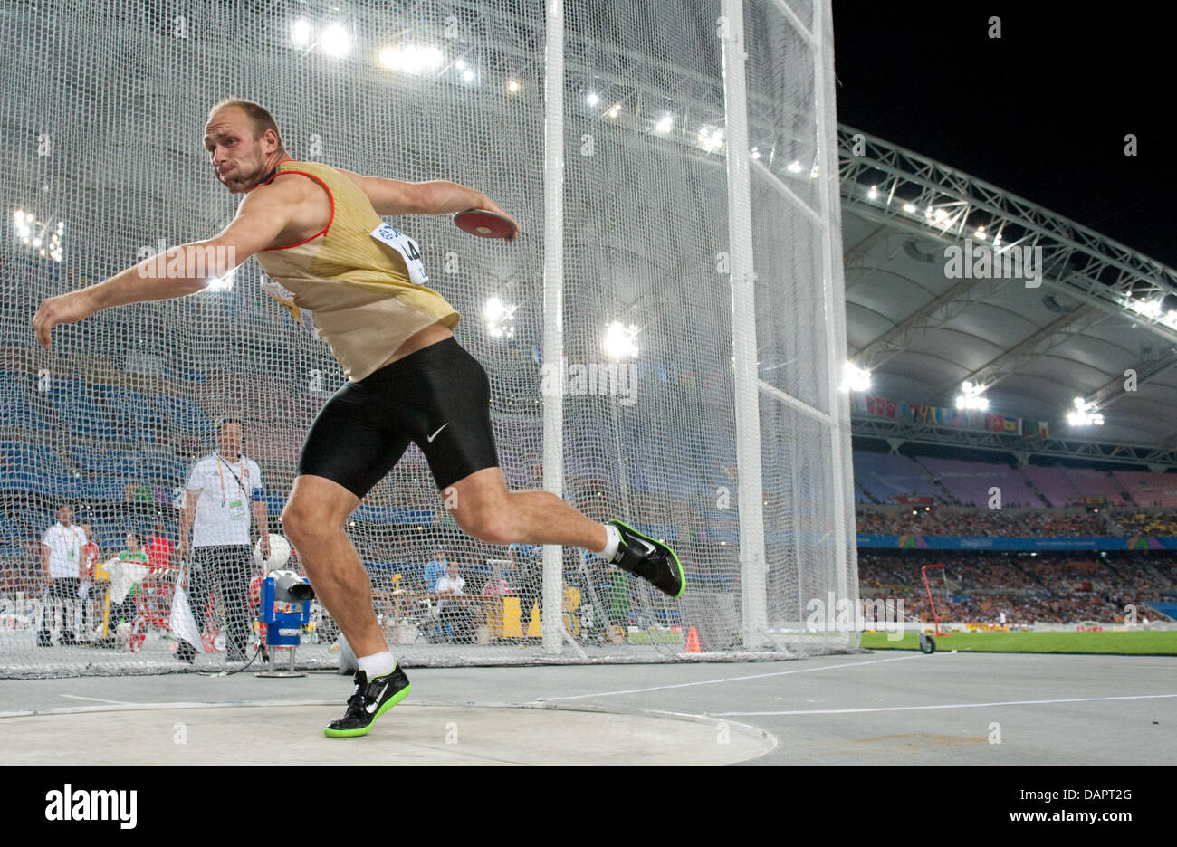 Robert Harting of Germany competes in the Mens Discus Throw final at ...
