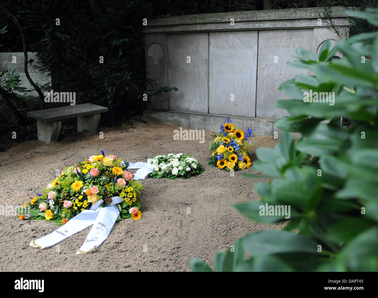 Flowers are set down on the grave of German humorist Loriot at ...