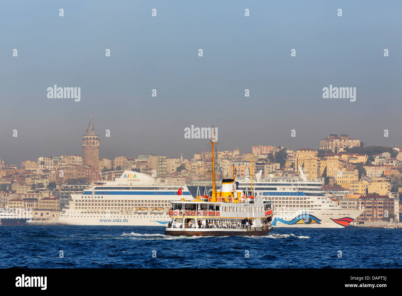 Turkey, Istanbul, View of ferry boat and MS AIDA diva cruise liner on ...