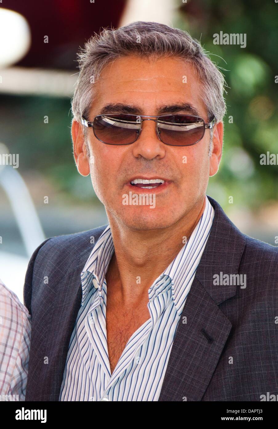 US actor/director George Clooney arrives for the press conference of ...