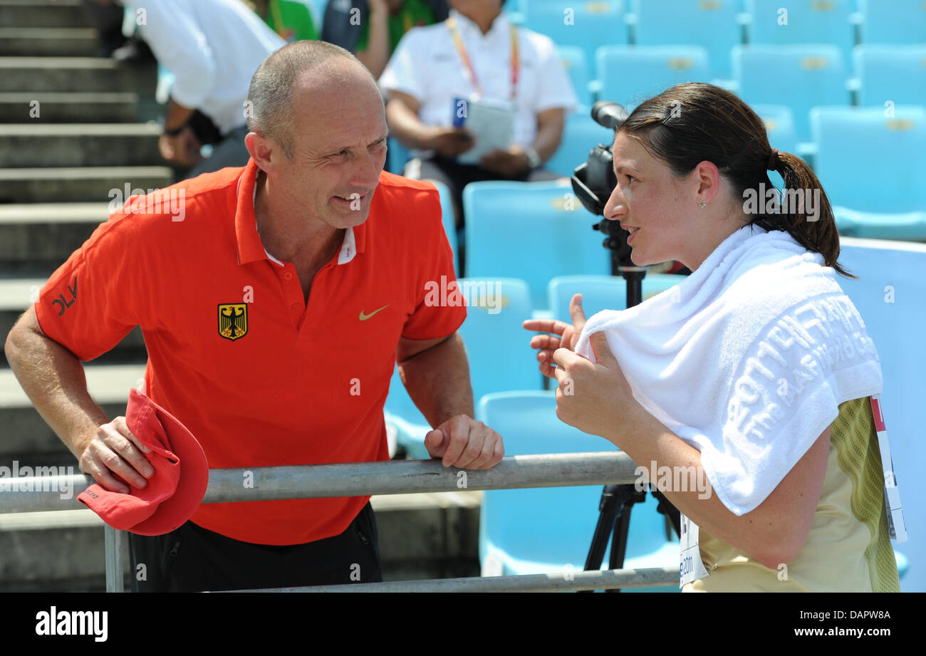 Linda Stahl of Germany with coach Helge Zöllkau in Javelin Throw ...